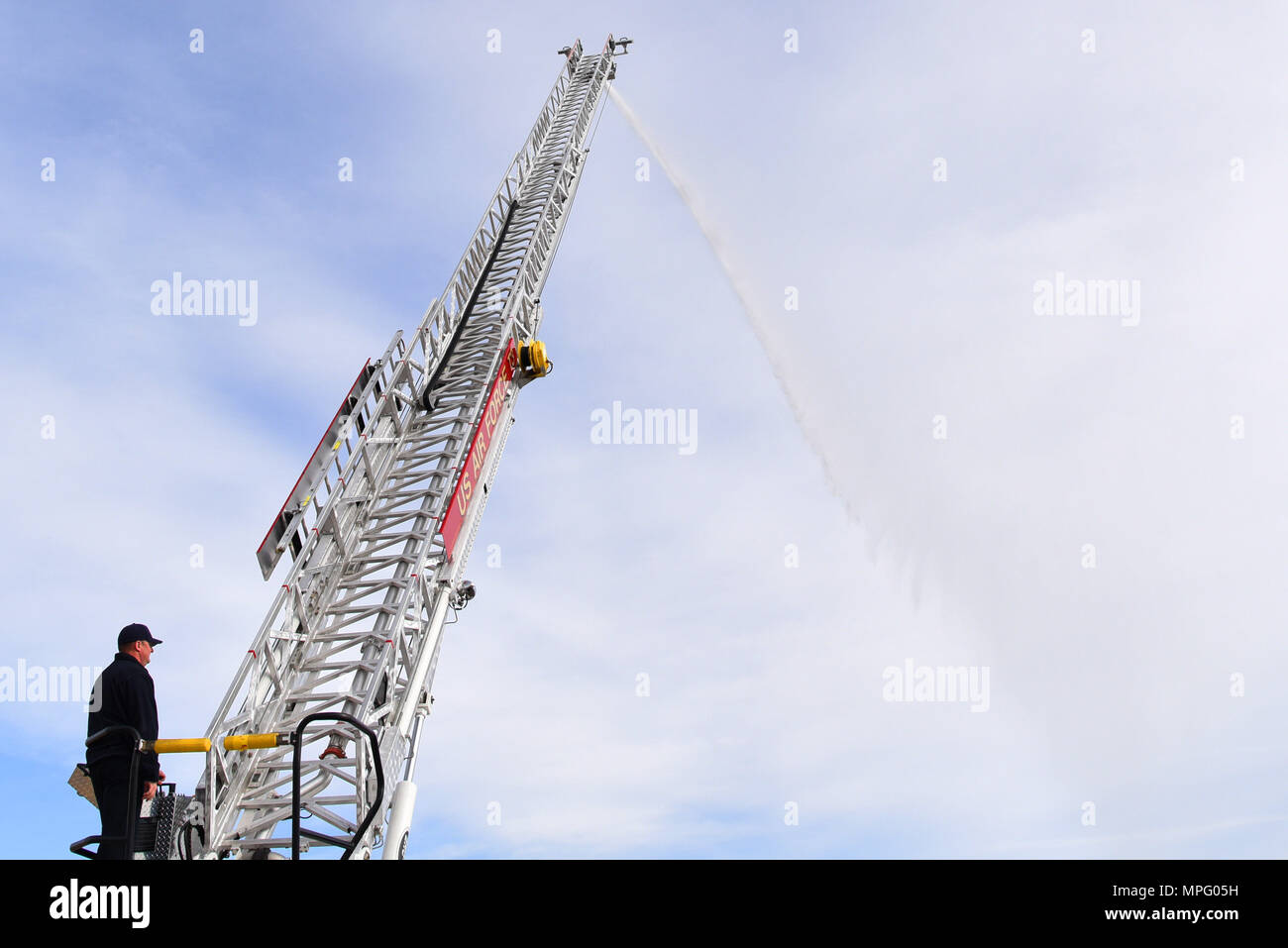 Patrick Rolfe, Buckley Air Force Base firefighter, demonstrates the ...