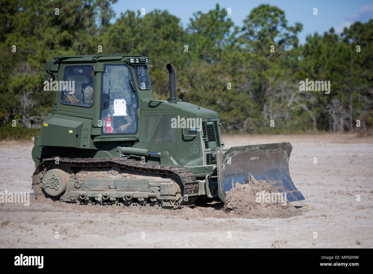 U.S. Marine Corps Lance Cpl. Omar M. Gordon, a heavy equipment operator ...