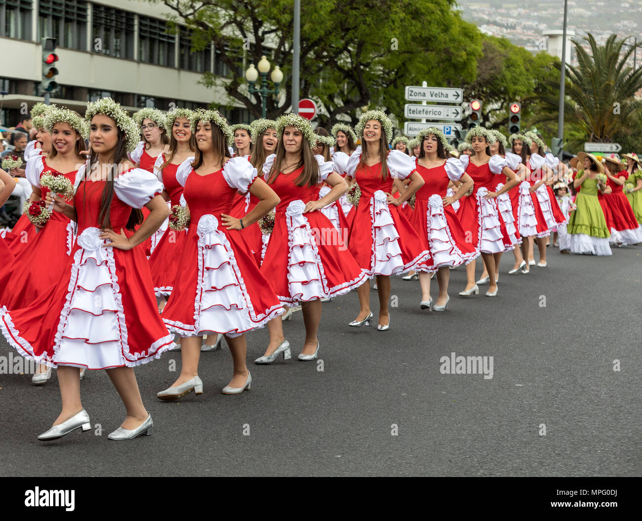 Funchal; Madeira; Portugal - April 22; 2018: A group of women in red ...