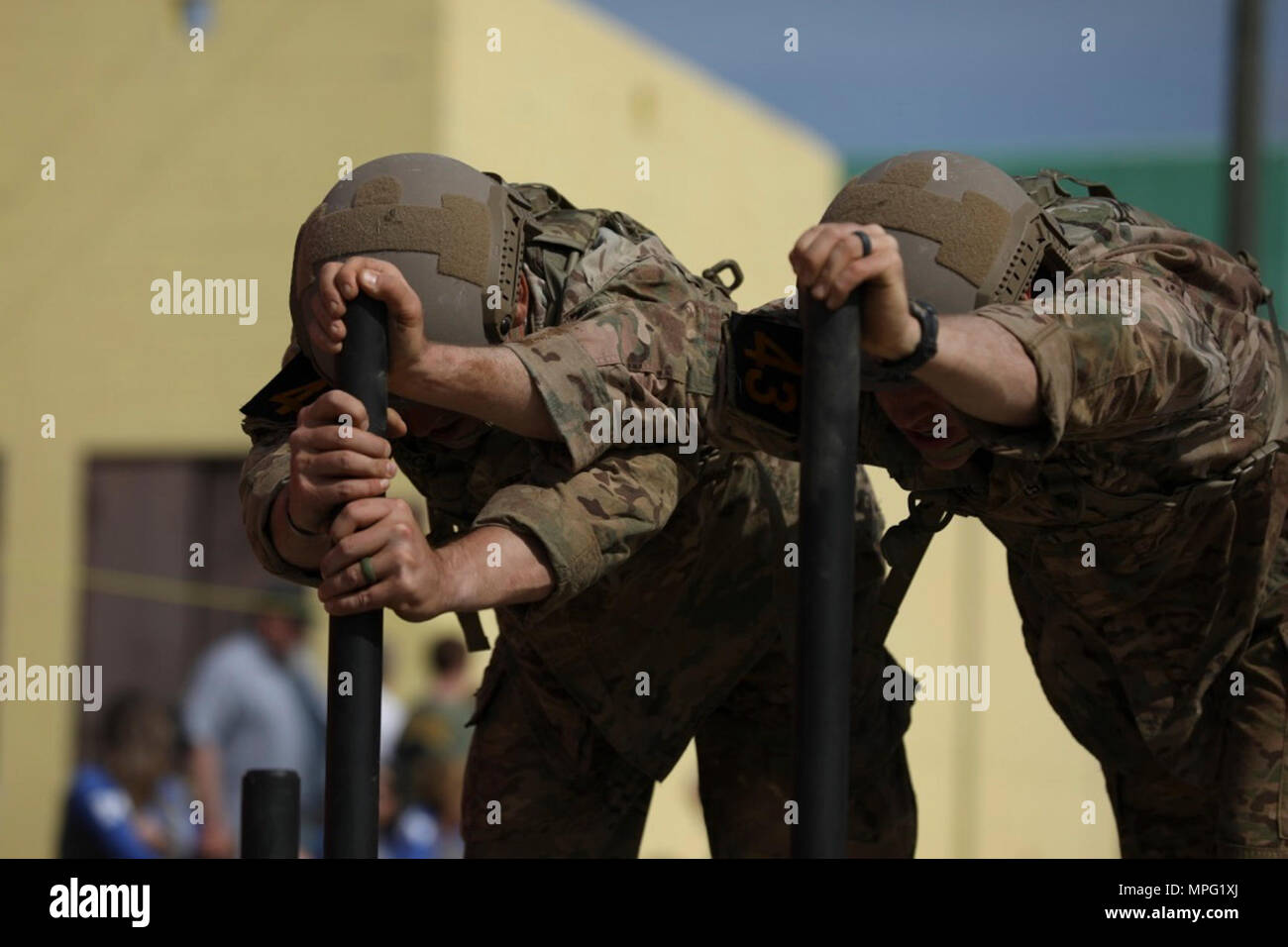 U.S. Army Rangers push a weighted sled during The 35th Annual David E ...