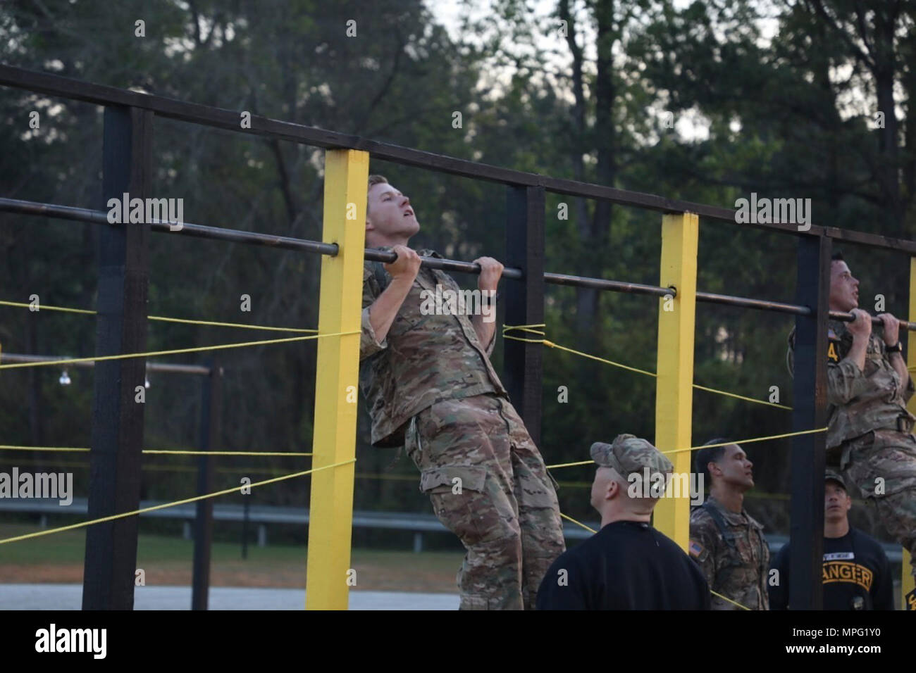 A U.S. Army Ranger performs pull-ups on Malvesti during The 35th Annual ...