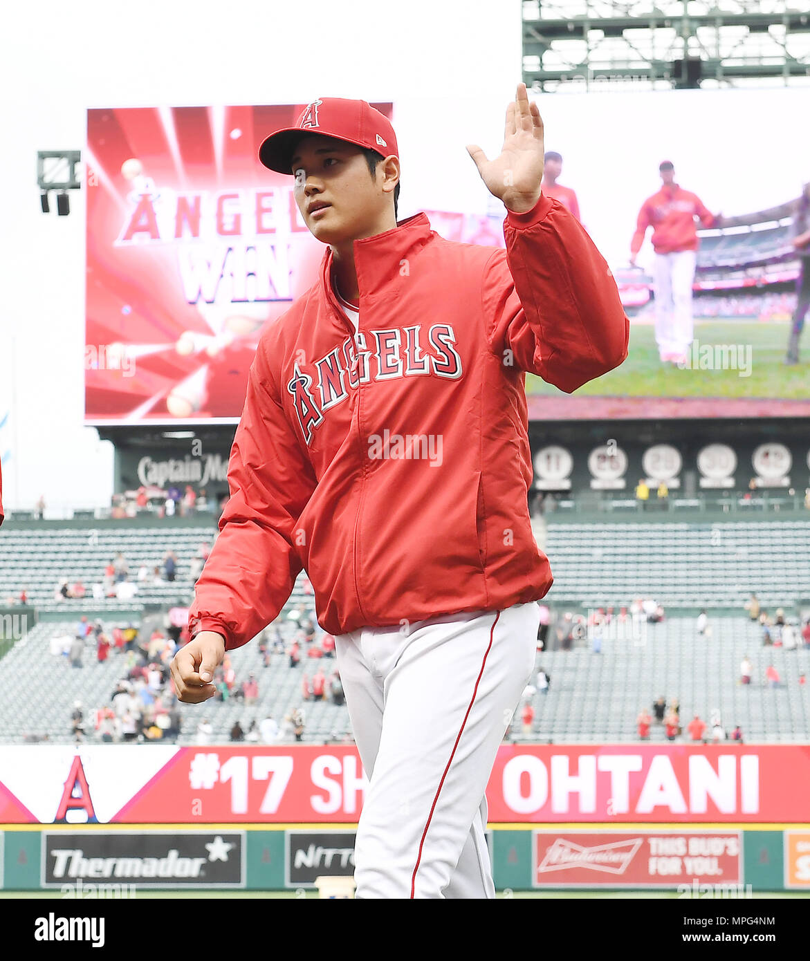 Los Angeles Angels starting pitcher Shohei Ohtani waves to fans after ...