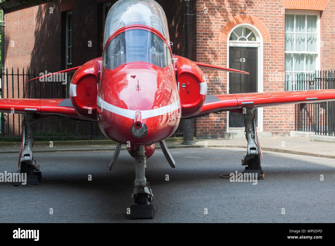 London UK. 23rd May 2018. A replica Red Arrows Hawk airplane used for ...