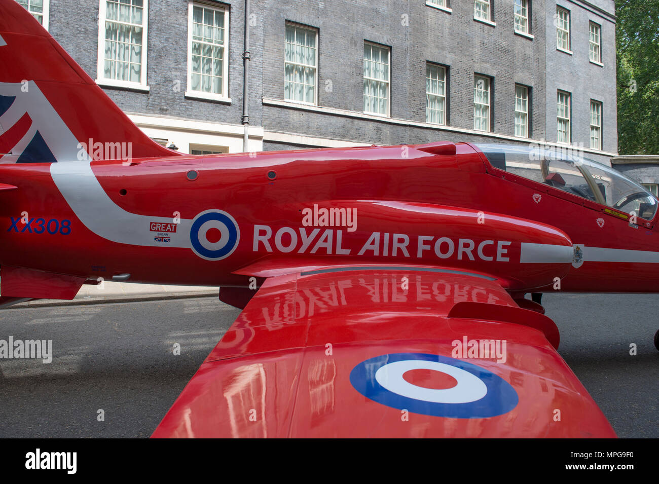 Downing Street, London, UK. 23 May 2018. Royal Air Force Red Arrows Hawk jet in Downing Street ...