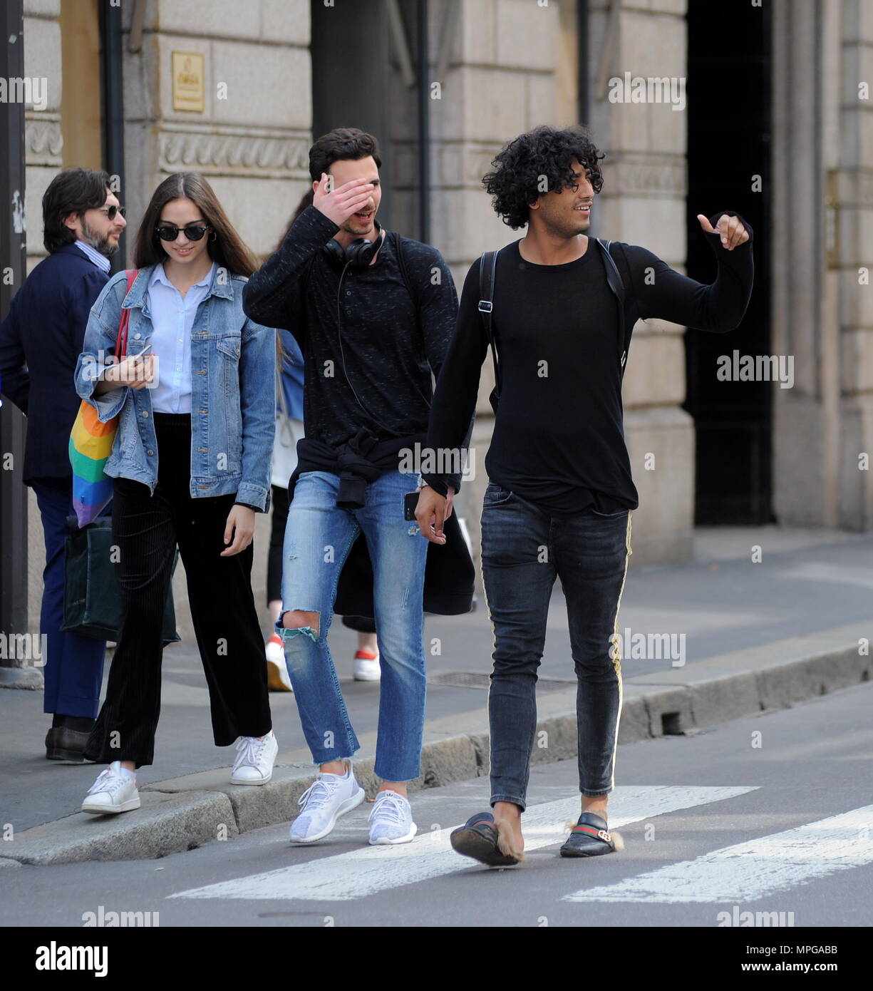 Milan, Akash Kumar walking downtown with friends Akash Kumar, 26-year-old Indio-Brazilian model ...