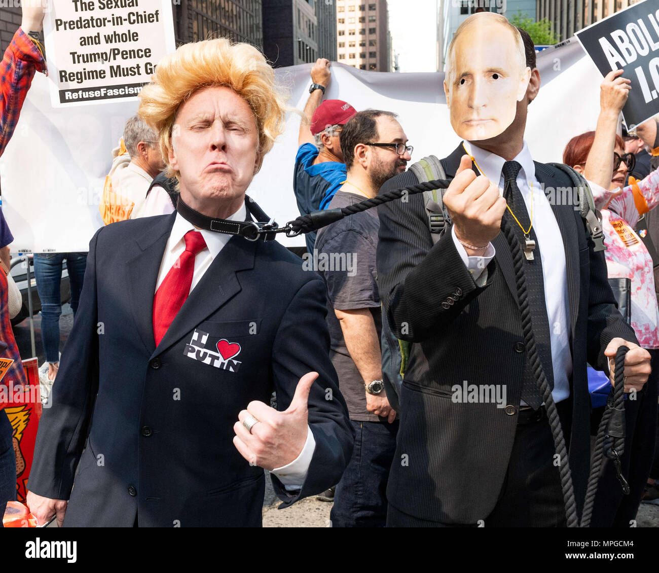 New York, NY, USA. 23rd May, 2018. A fake Donald Trump on a leash held ...