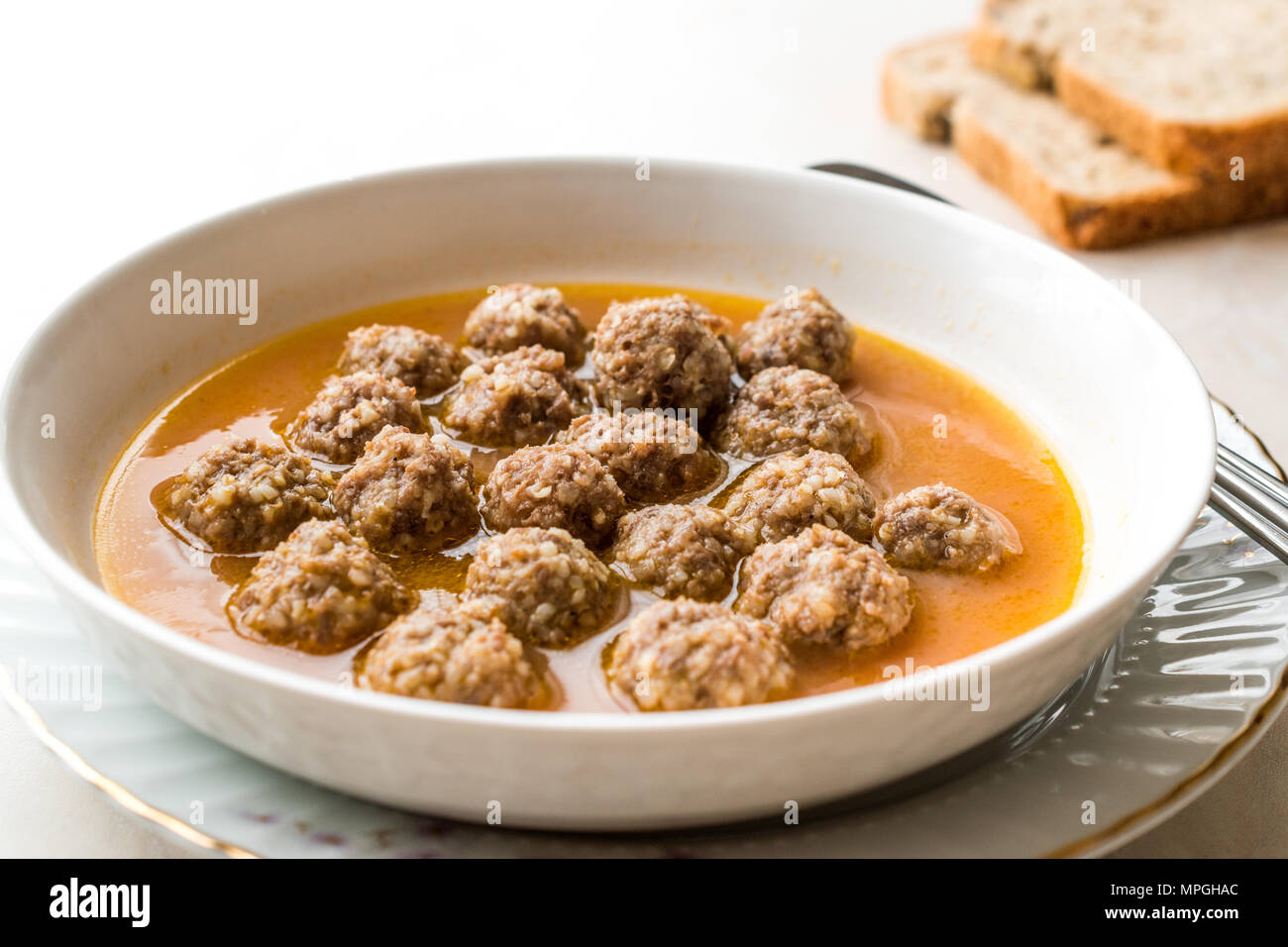 Turkish food Sulu Kofte / Juicy Meatballs Soup with Bread. Traditional ...