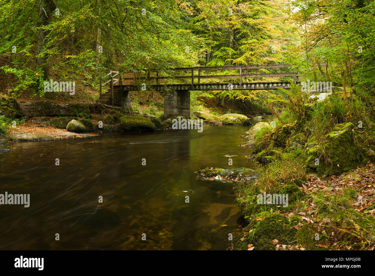 Ash Bridge over the East Lyn River in Exmoor National Park, Devon ...