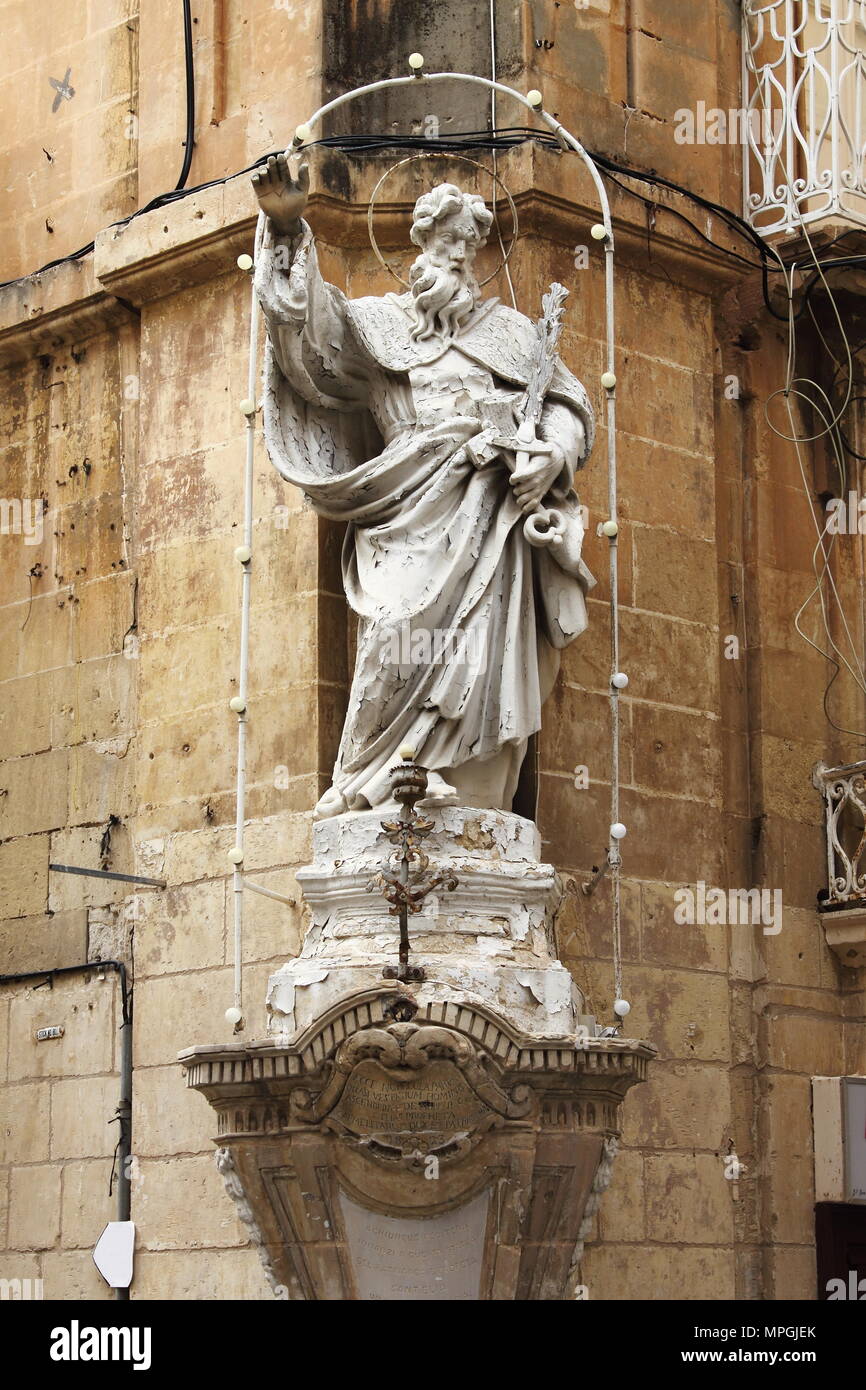 Statue of a Saint at the corner of a street in Valletta old town, Malta ...