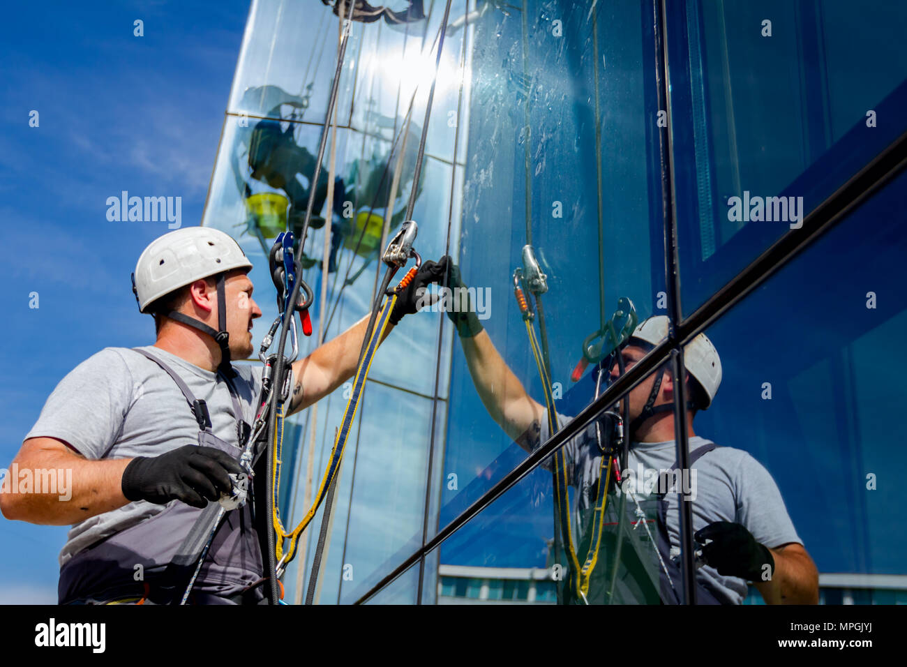 Closeup view on smears silicone on joints between windows with ...