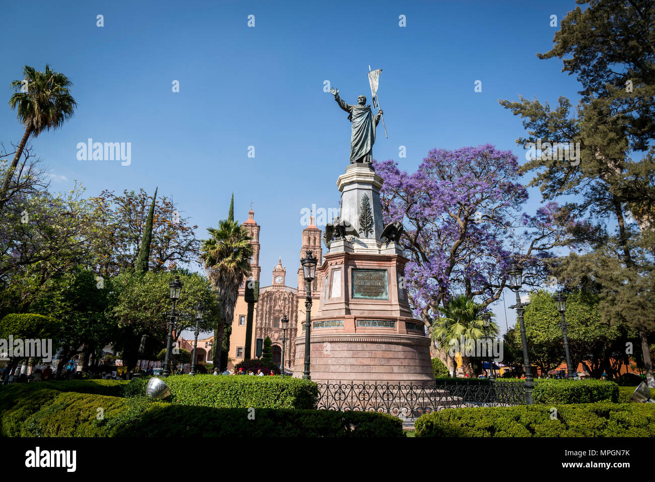 Statue of Hidalgo in the city park in front of the Parish Church ...