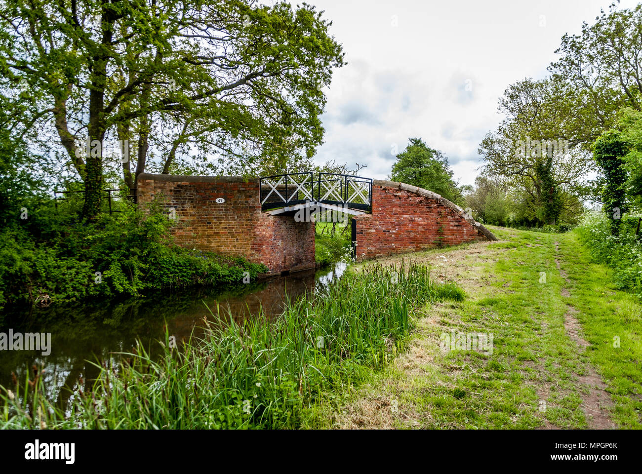 English Canal red brick bridge Stock Photo - Alamy