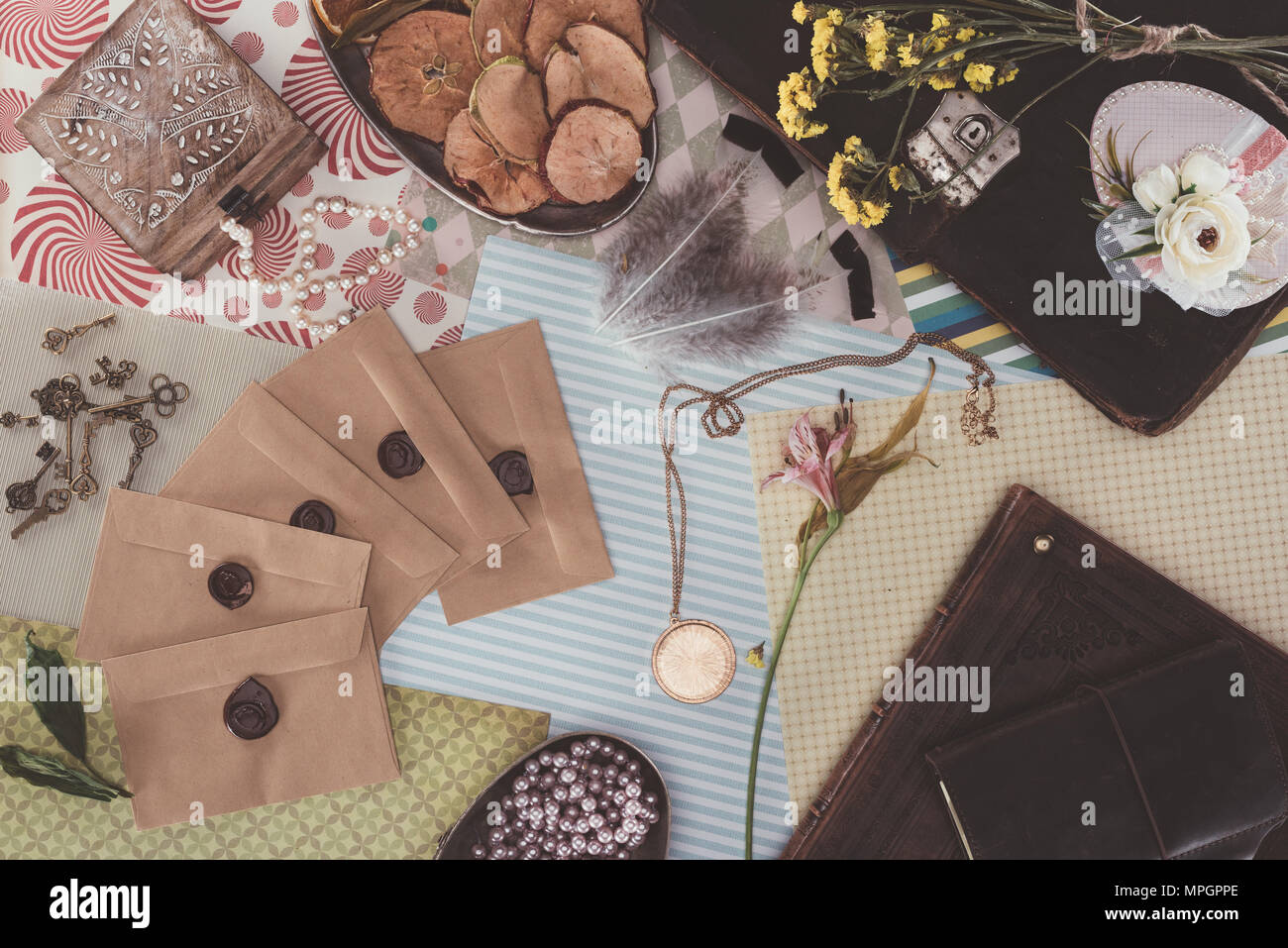 top view of retro objects over pack paper background Stock Photo - Alamy