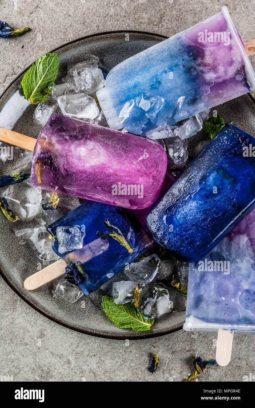 Naturally organic summer sweets, homemade blue and violet ice cream ...