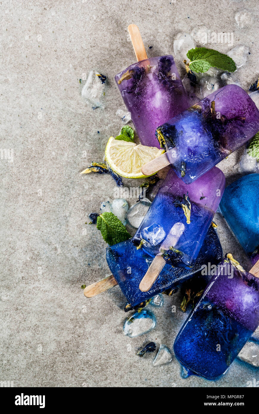 Naturally organic summer sweets, homemade blue and violet ice cream ...