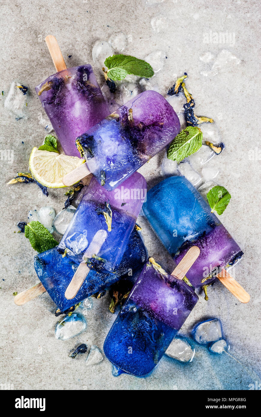 Naturally organic summer sweets, homemade blue and violet ice cream ...