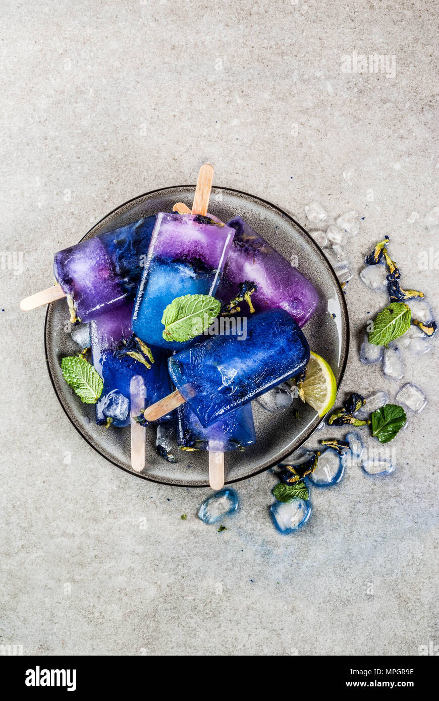 Naturally organic summer sweets, homemade blue and violet ice cream ...