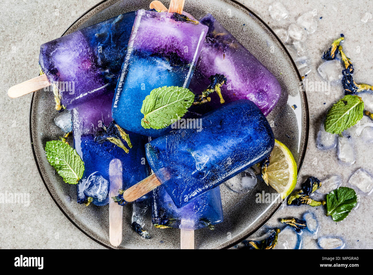 Naturally organic summer sweets, homemade blue and violet ice cream ...