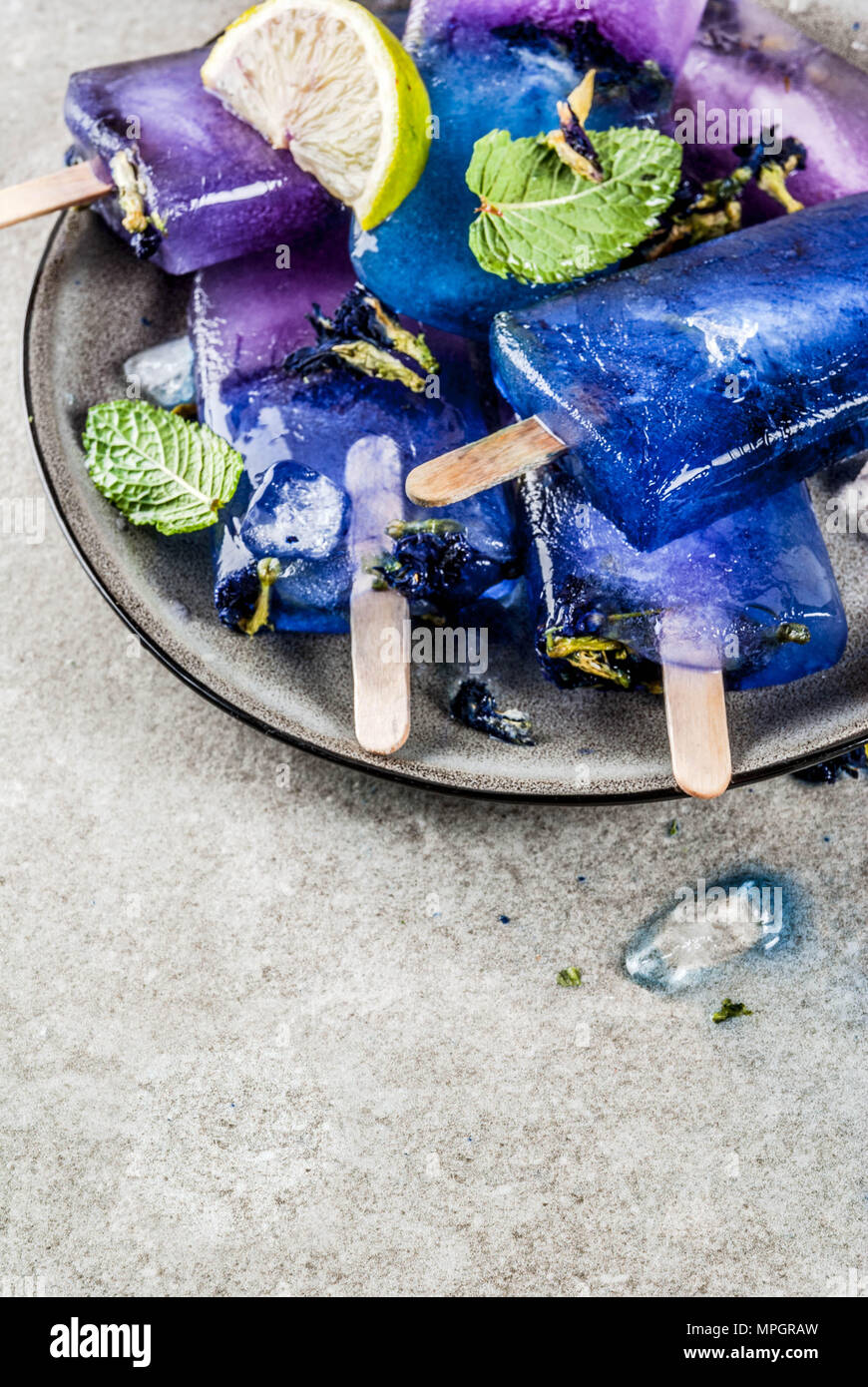 Naturally organic summer sweets, homemade blue and violet ice cream ...
