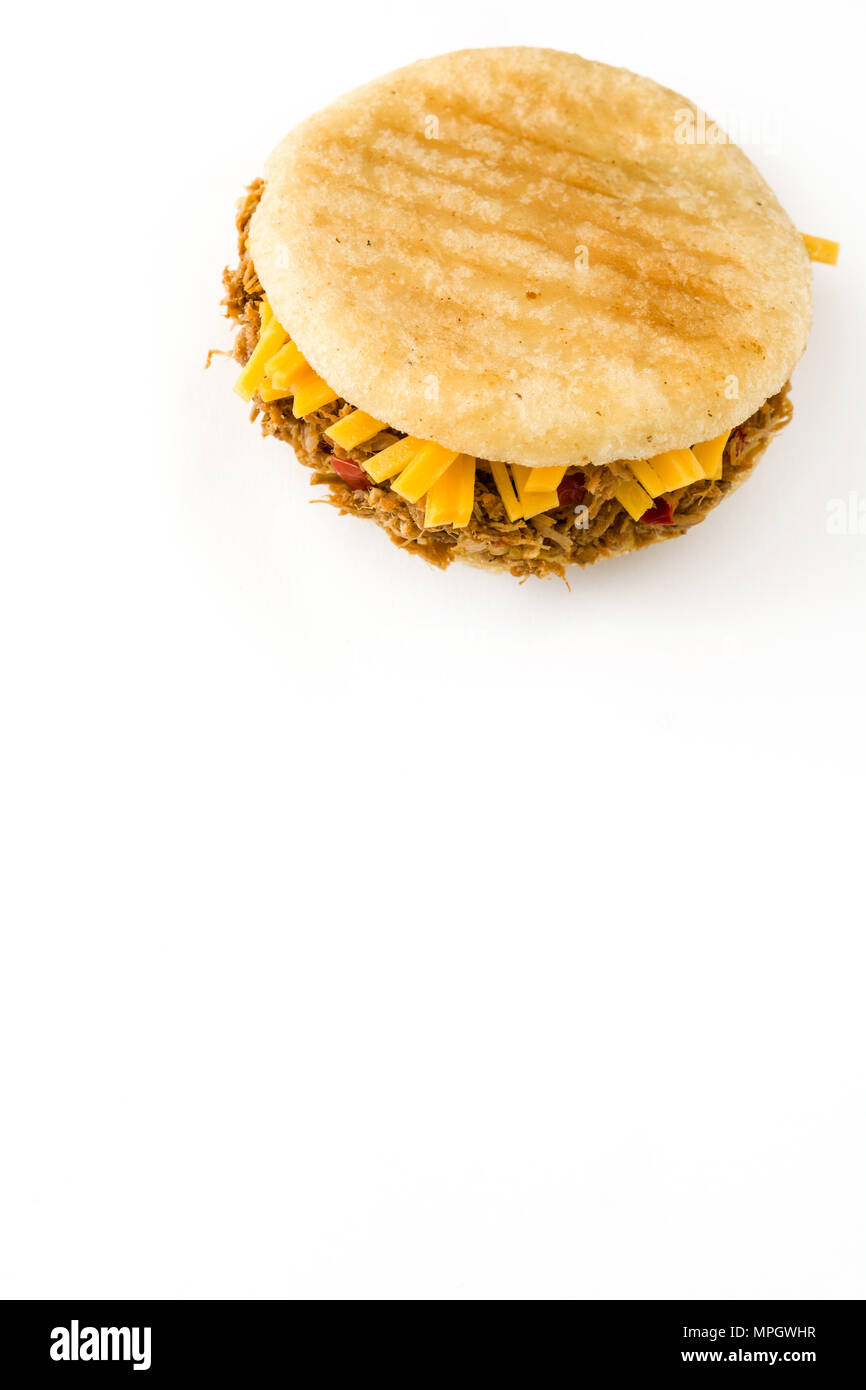 Arepa with shredded beef and cheese isolated on white background ...