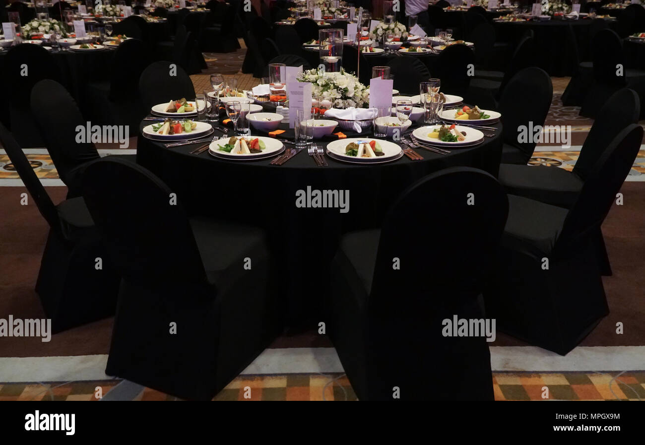 a wonderfully designed wedding room and dining tables or gala concept ...