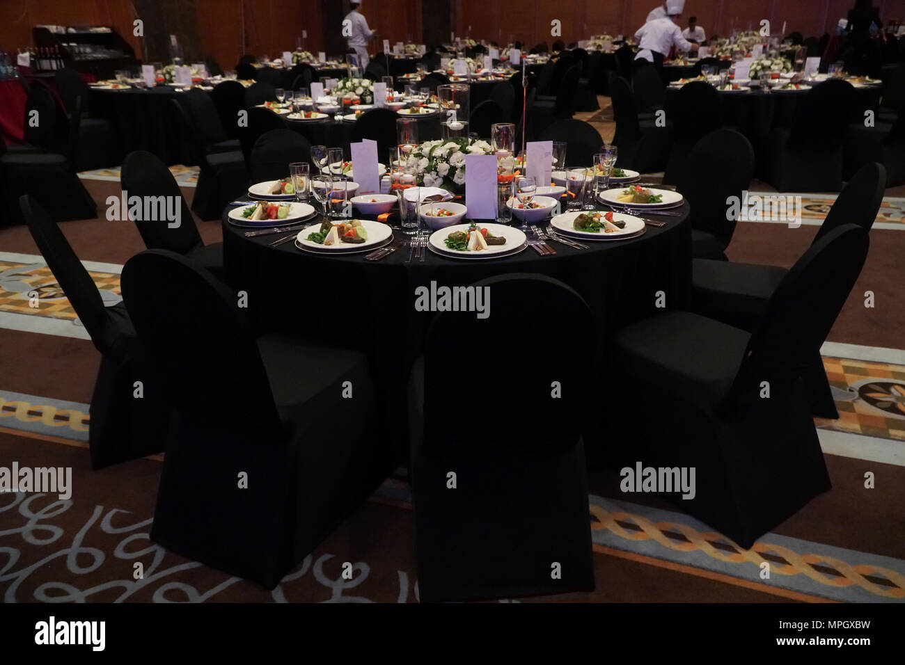 a wonderfully designed wedding room and dining tables or gala concept ...