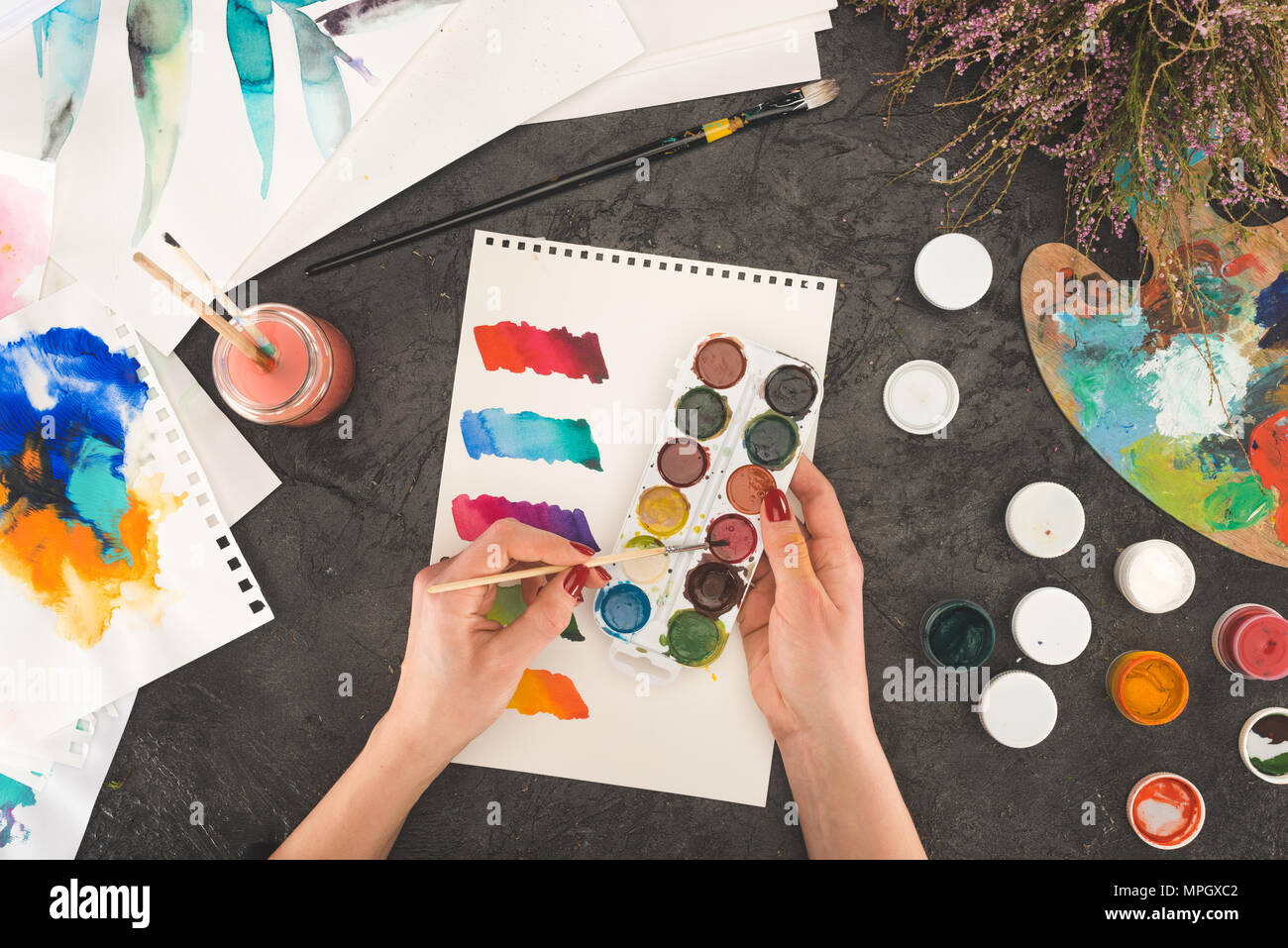 artist mixing watercolor paints Stock Photo - Alamy