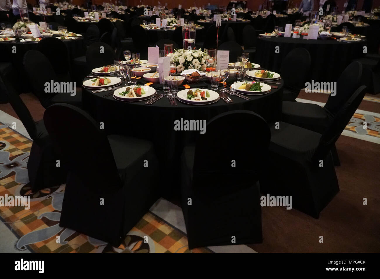 a wonderfully designed wedding room and dining tables or gala concept ...