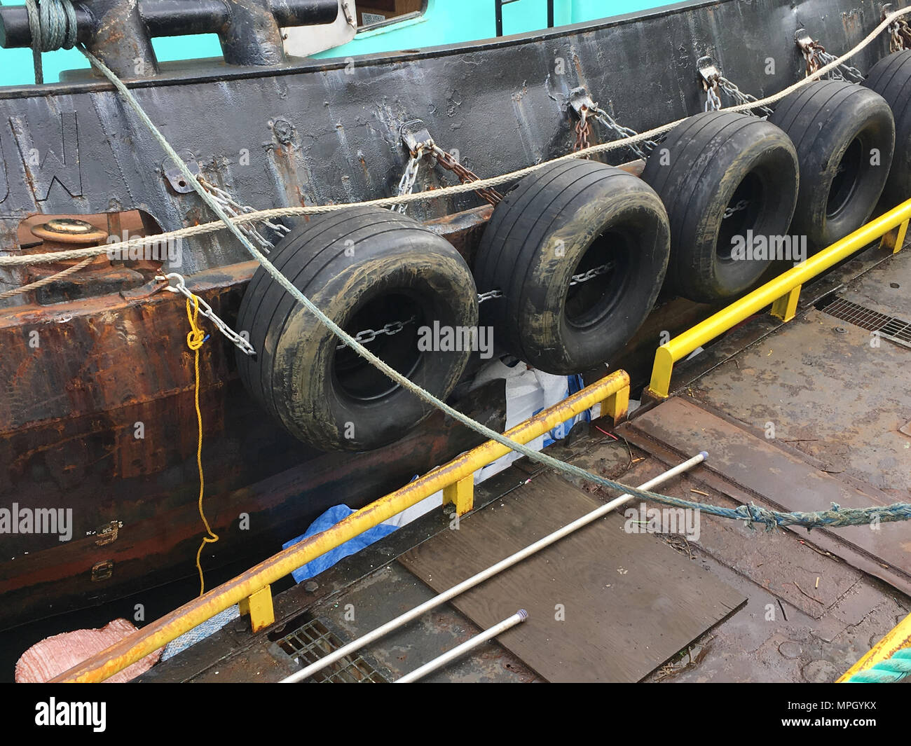 A tug owned and operated by Island Tug and Barge sits in mooring after ...