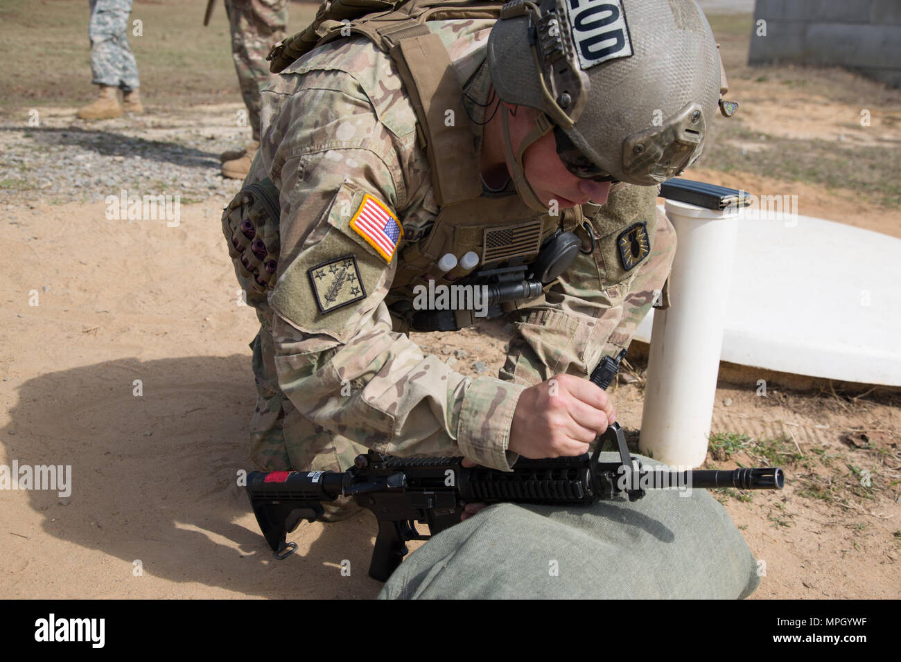 U.S. Army Sgt. Devin McAdams, assigned to 18th Ordnance Company (EOD ...