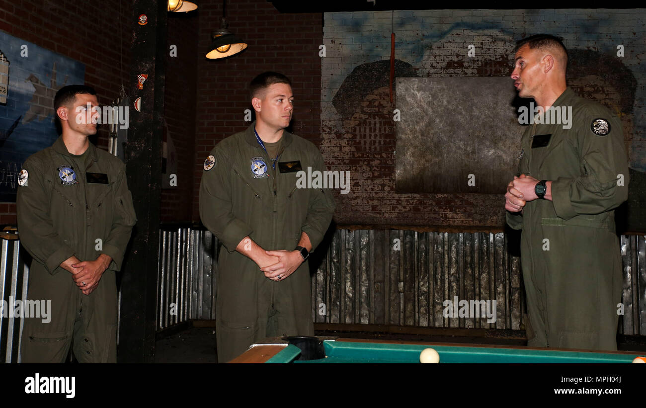 Lieutenant Colonel Gregory J. Summa, right, addresses Capt. Taylor ...