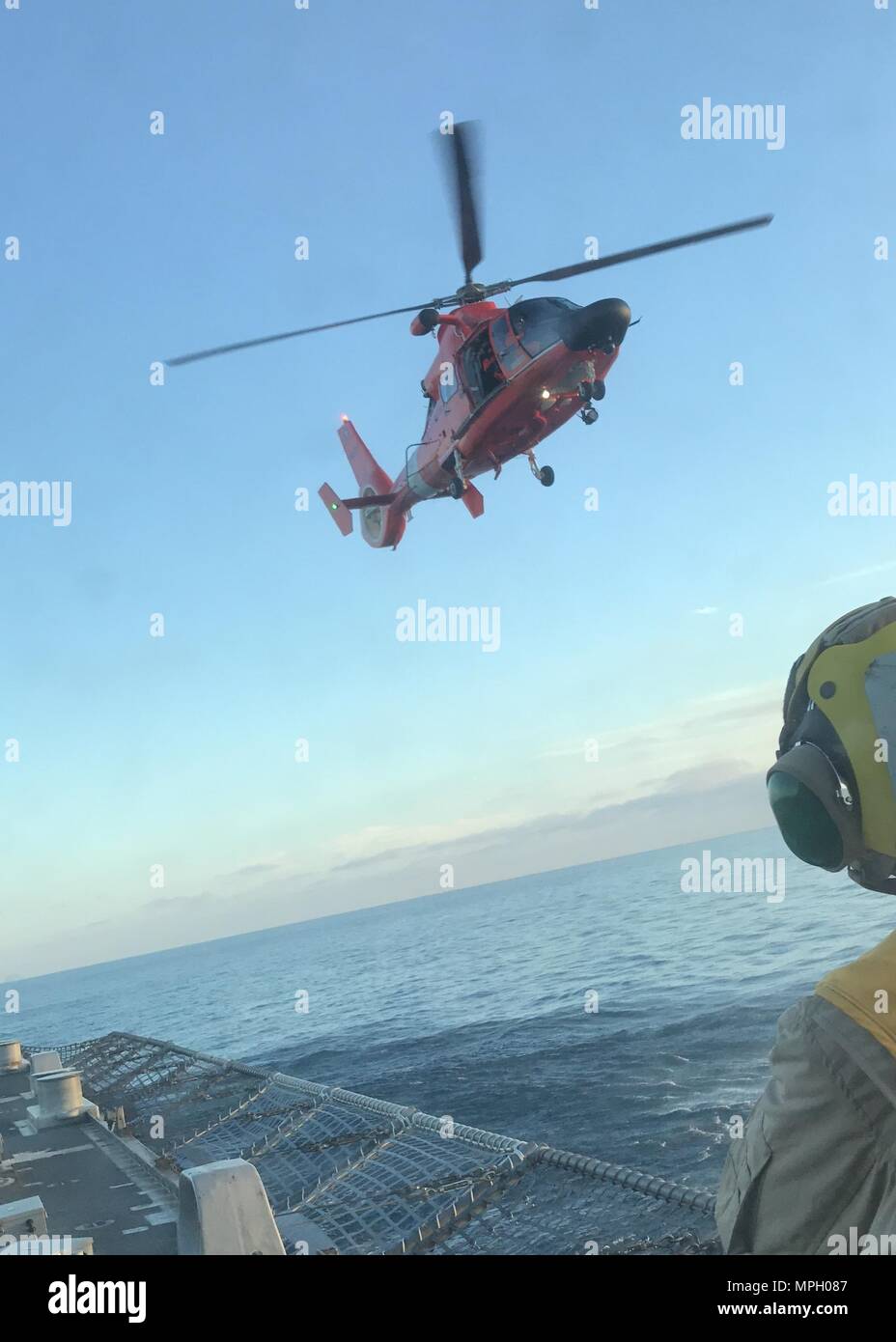 170216-N-ZZ999-005 PACIFIC OCEAN – A U.S. Coast Guard helicopter ...