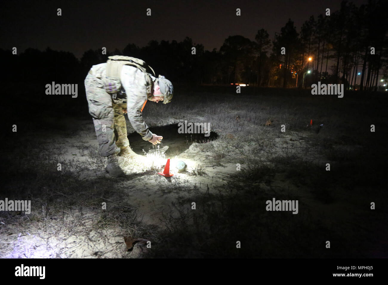 U.S. Army Sgt. Devin McAdams, assigned to the 18th Ordnance Company ...