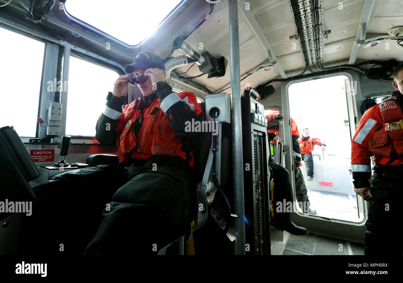 Coast Guard Fireman Brandon Bowen, a crew member at Coast Guard Station ...
