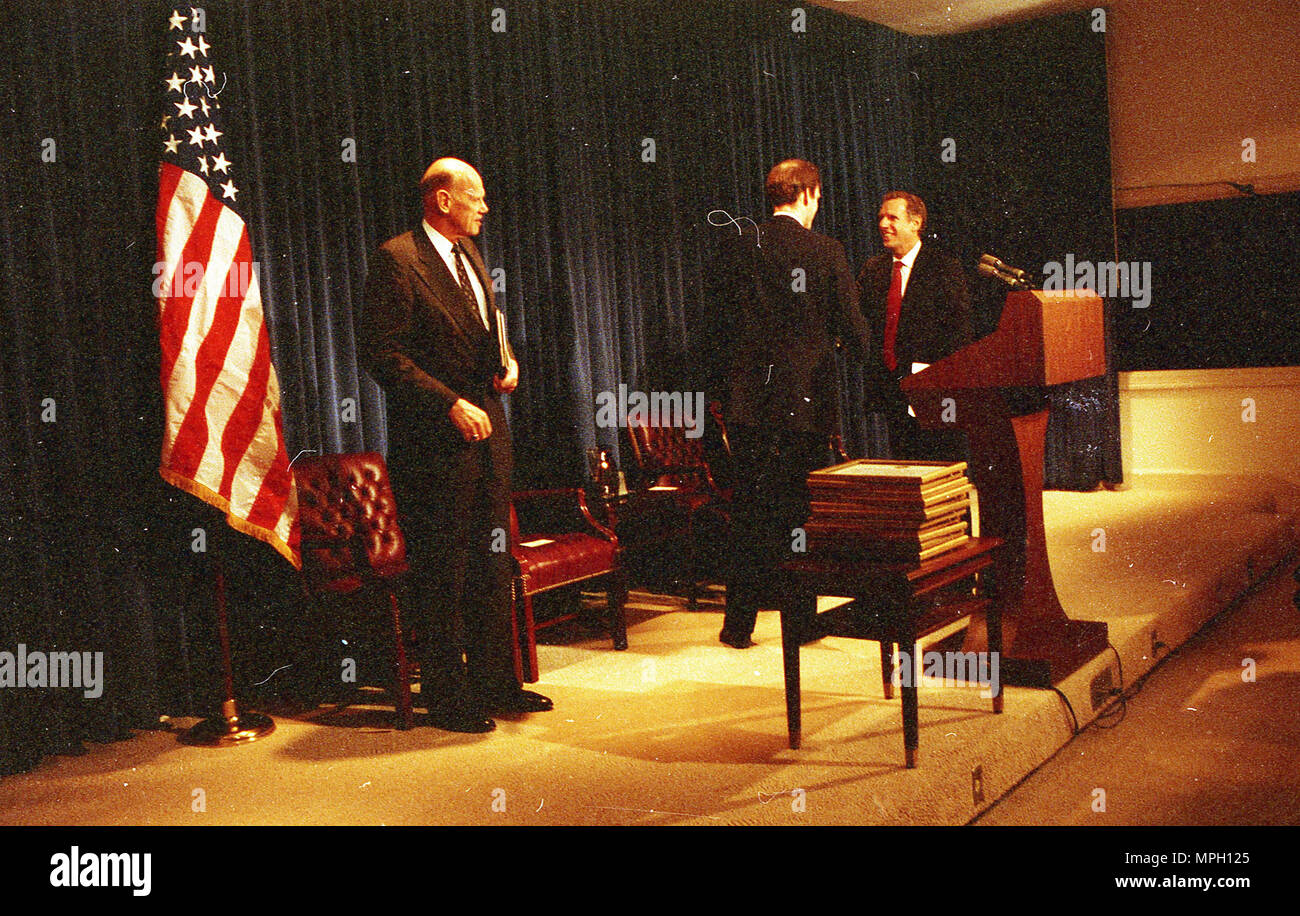 THREE MEN ON STAGE GREETING EACH OTHER Stock Photo - Alamy
