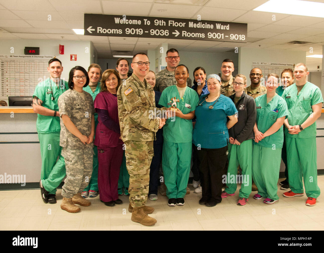Maj. Jerry Moon (center), nurse methods analyst, Nursing Operations ...