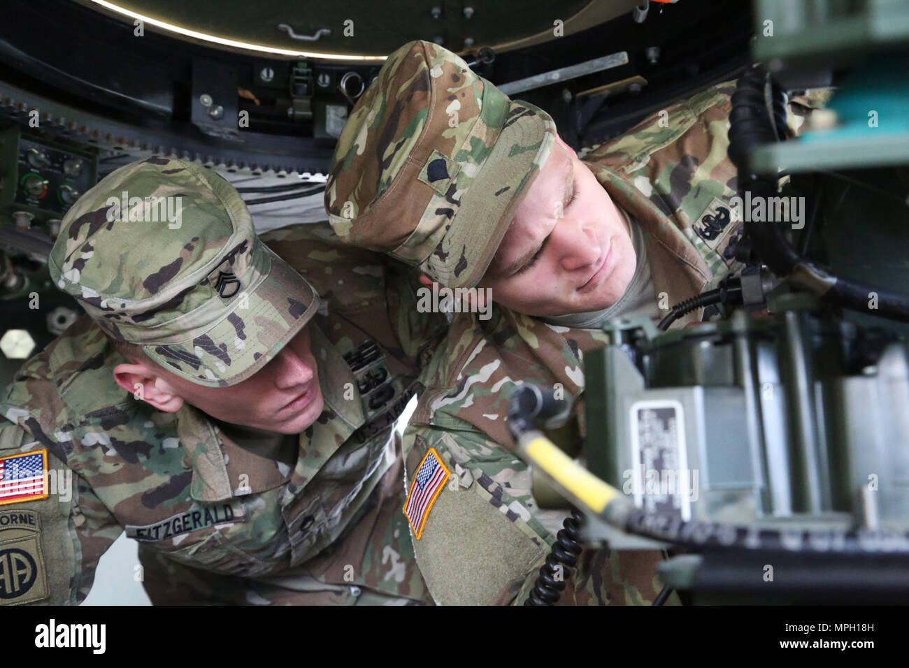 U.S. Army Staff Sgt. Eric Fitzgerald and Spc. Andrew Brotherton, 767th ...
