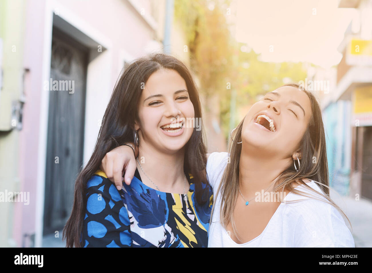 Portrait of two best friends, smiling and having fun together. Outdoor ... Portrait of two best friends, smiling and having fun together. Outdoor ...