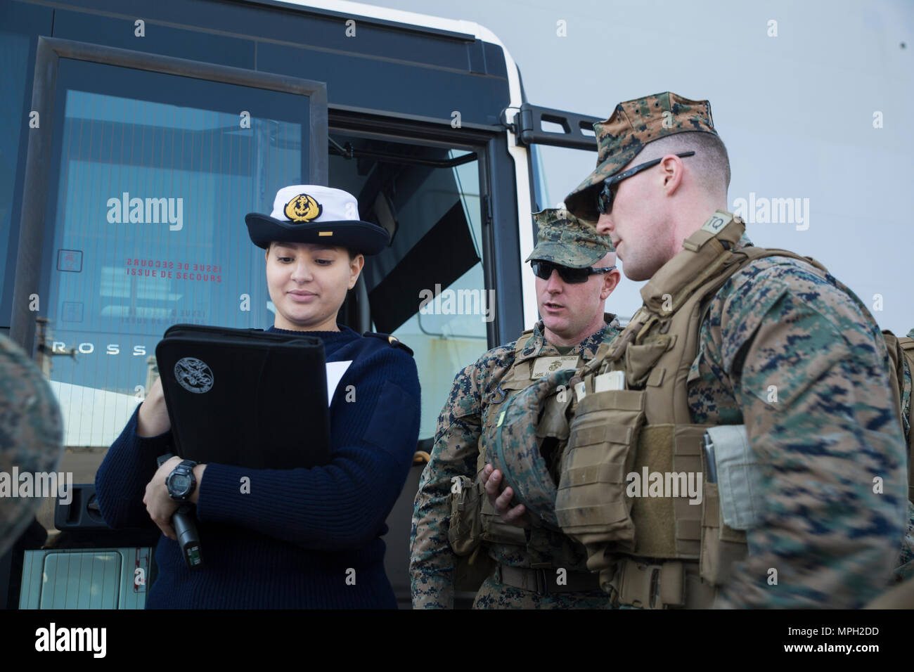 U.S. Marines assigned to Black Sea Rotational Force coordinate with a French officer before ...
