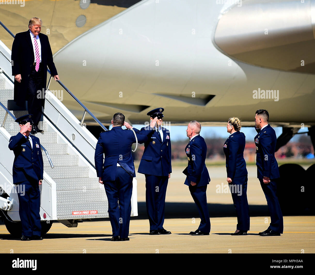 President Donald J. Trump is greeted by Maj. Gen. John K. McMullen ...