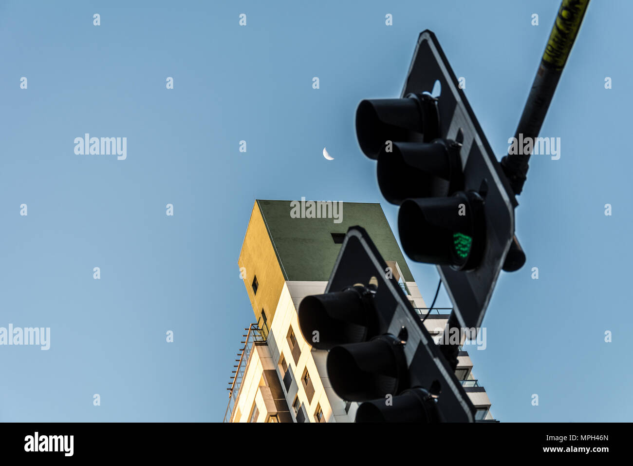 Traffic lights, building and the moon in Sao Paulo, Brazil Stock Photo ...