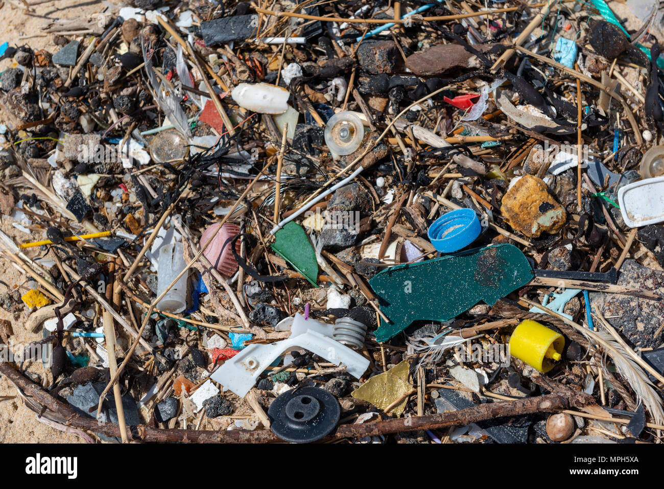 Plastic waste washed up on a beach Stock Photo - Alamy