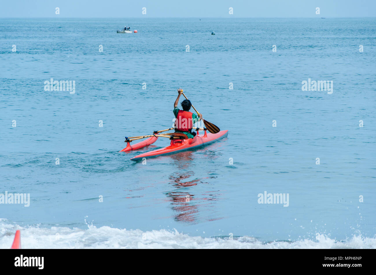 Kayaking. Man paddling a kayak Stock Photo - Alamy