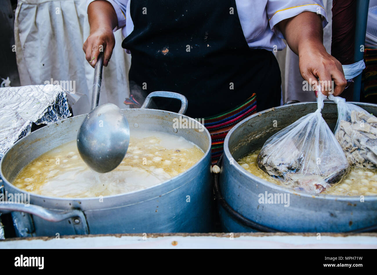 Peruvian food: Sopa criolla of caldo de mote Stock Photo - Alamy