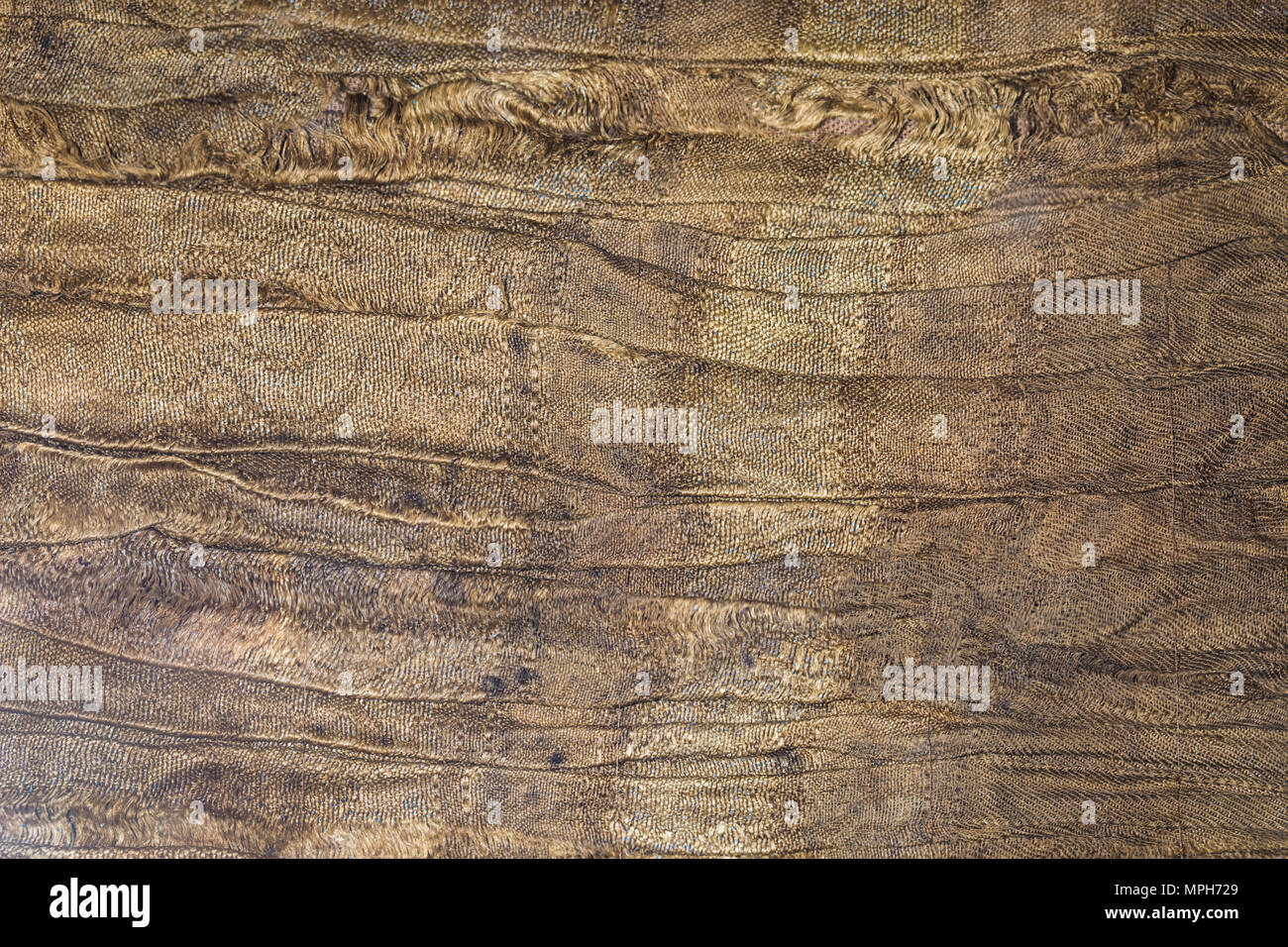 old a worn rag of orange color macro photo background image Stock Photo ...