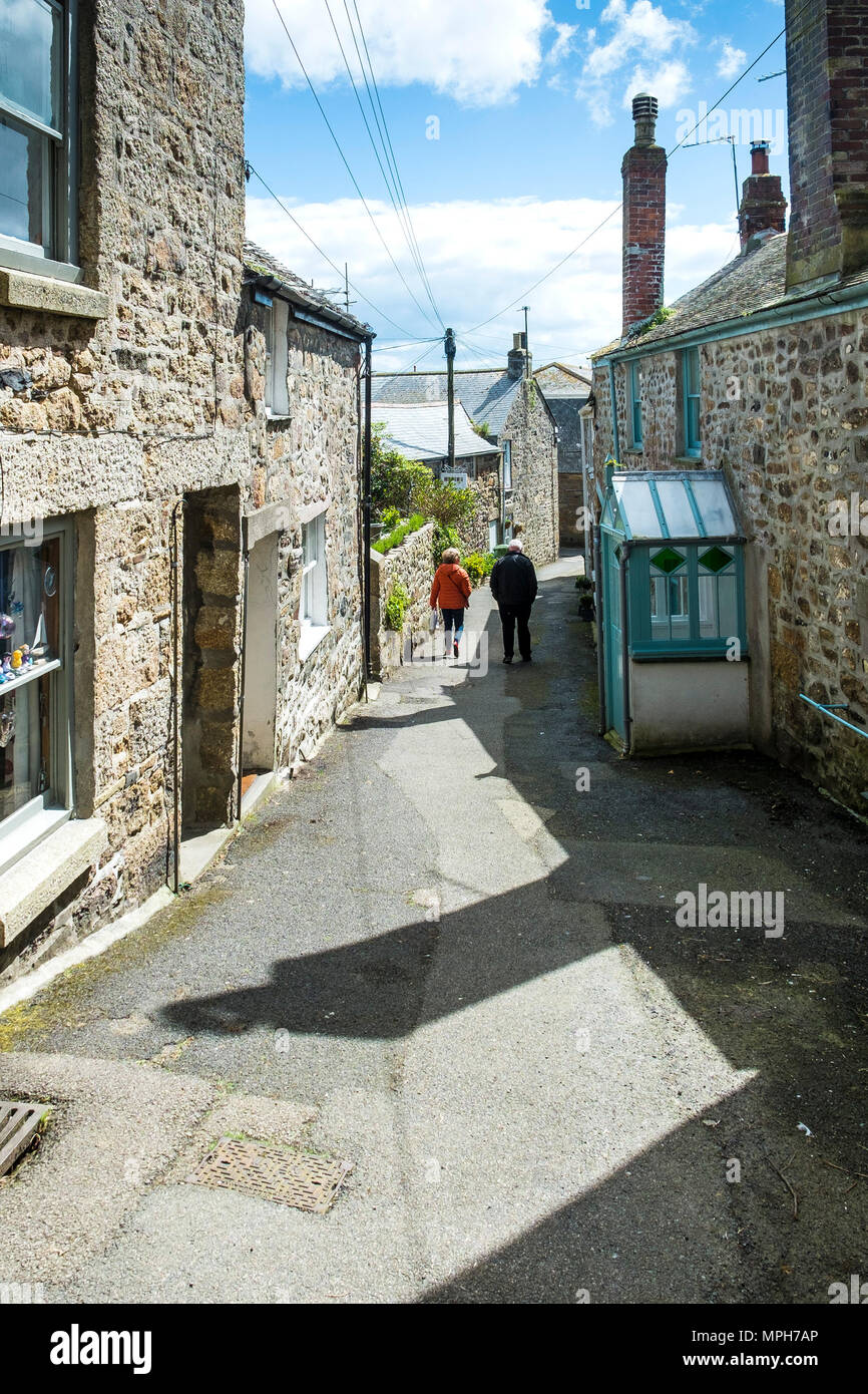 A quaint picturesque street in Mousehole Village in Cornwall Stock ...