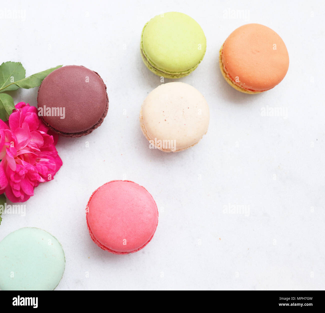 colorful macarons on white background Stock Photo - Alamy