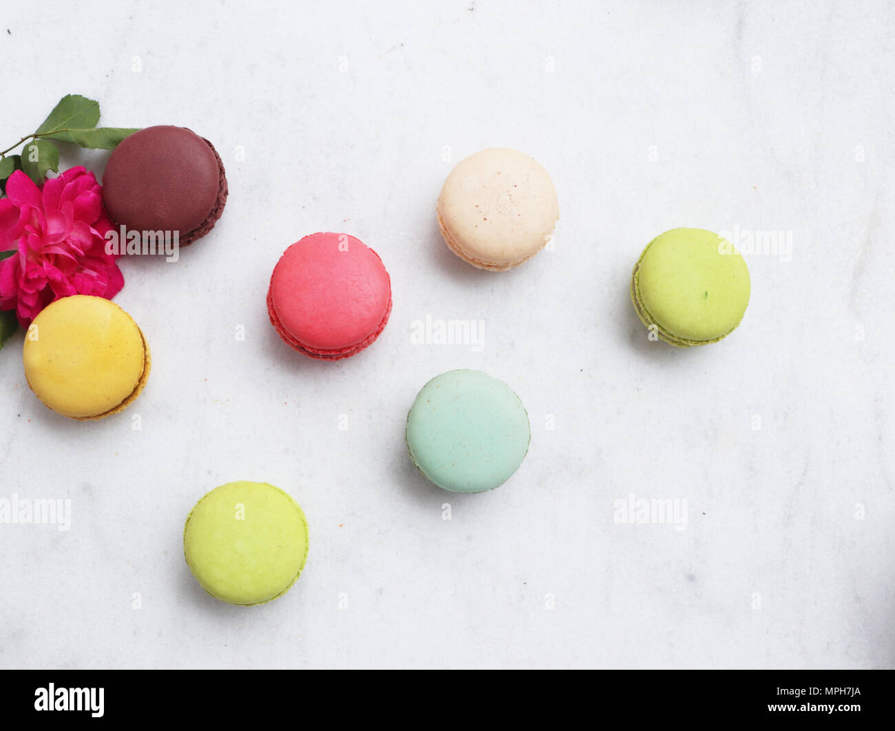 colorful macarons on white background Stock Photo - Alamy
