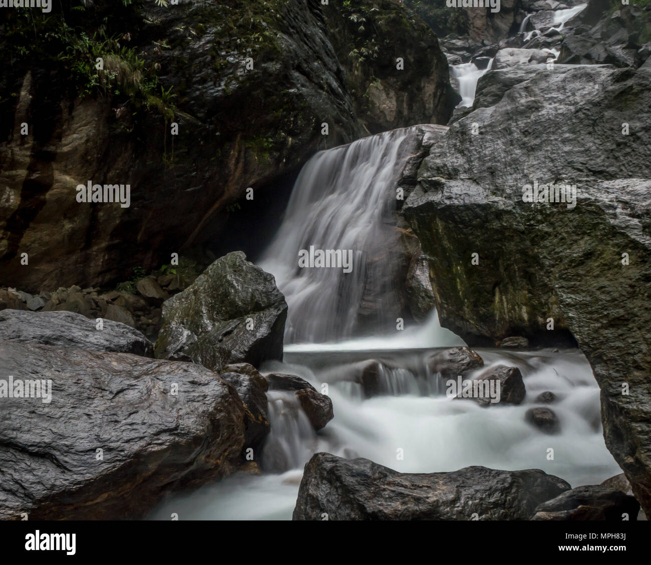 A view of the Naga waterfall on the way to Lachen from Gantok, Sikkim ...