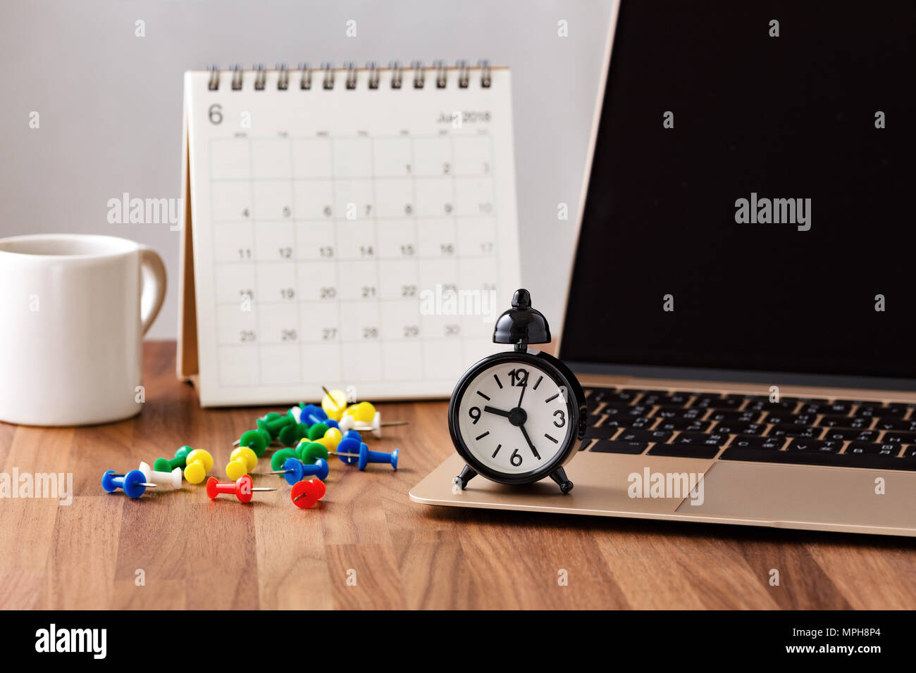 Time management concept with calendar, pins and clock on computer Stock Photo - Alamy